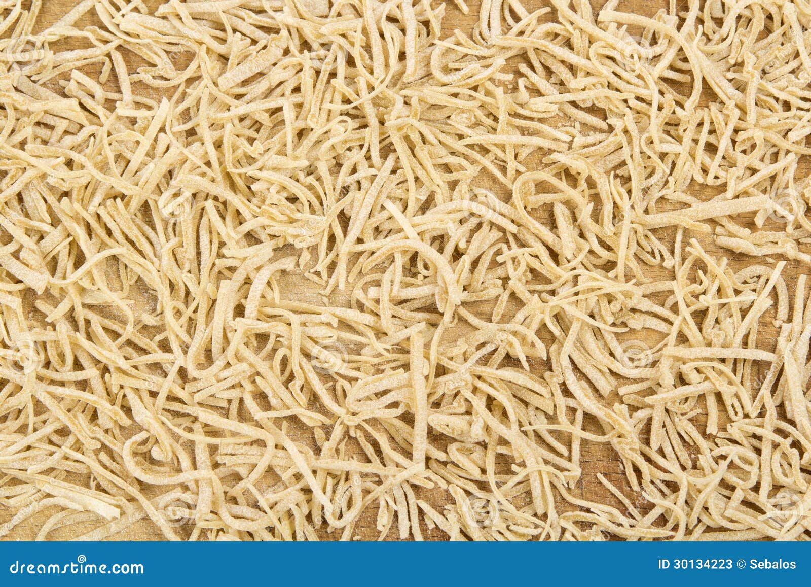 Scattered short noodles stock image. Image of studio - 30134223