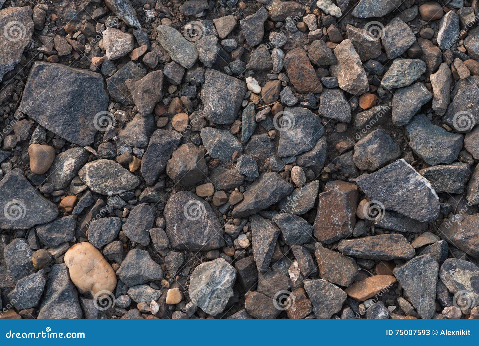 Scattered stones stock image. Image of asphalt, natural - 75007593