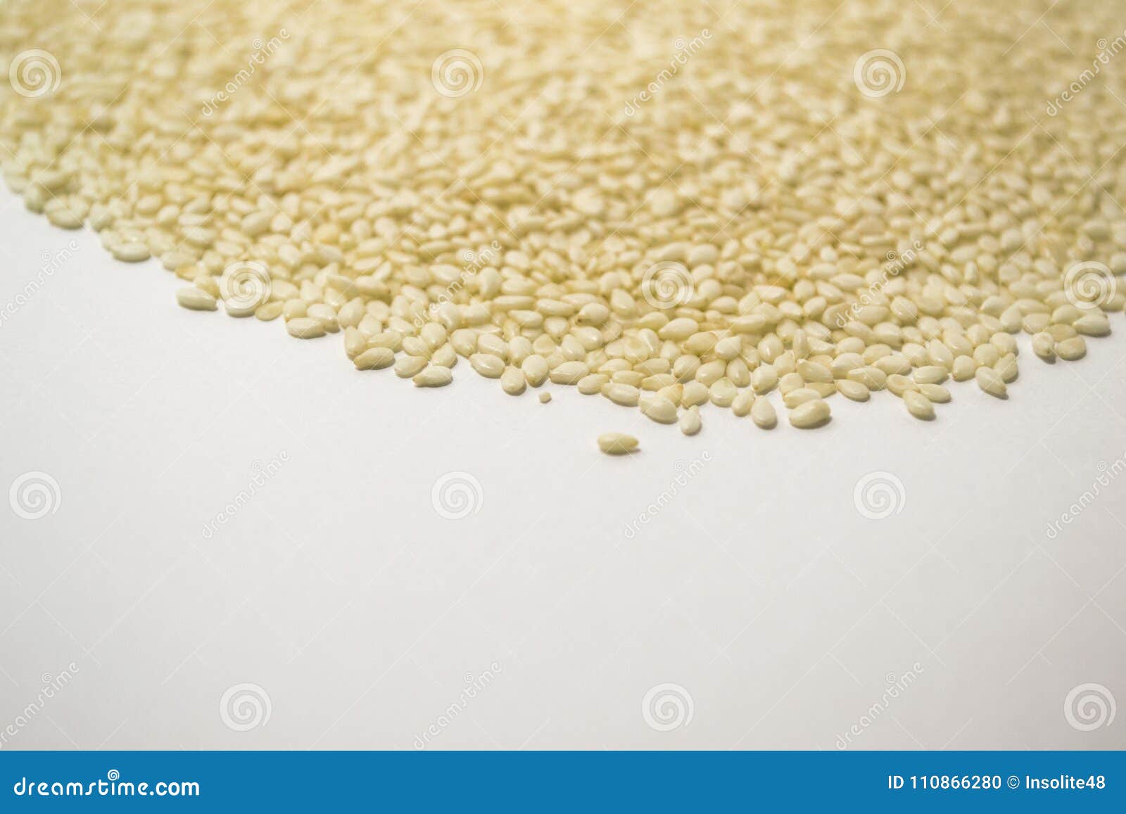 Scattered, White Sesame Seeds on a White Background. Sesamum Stock ...