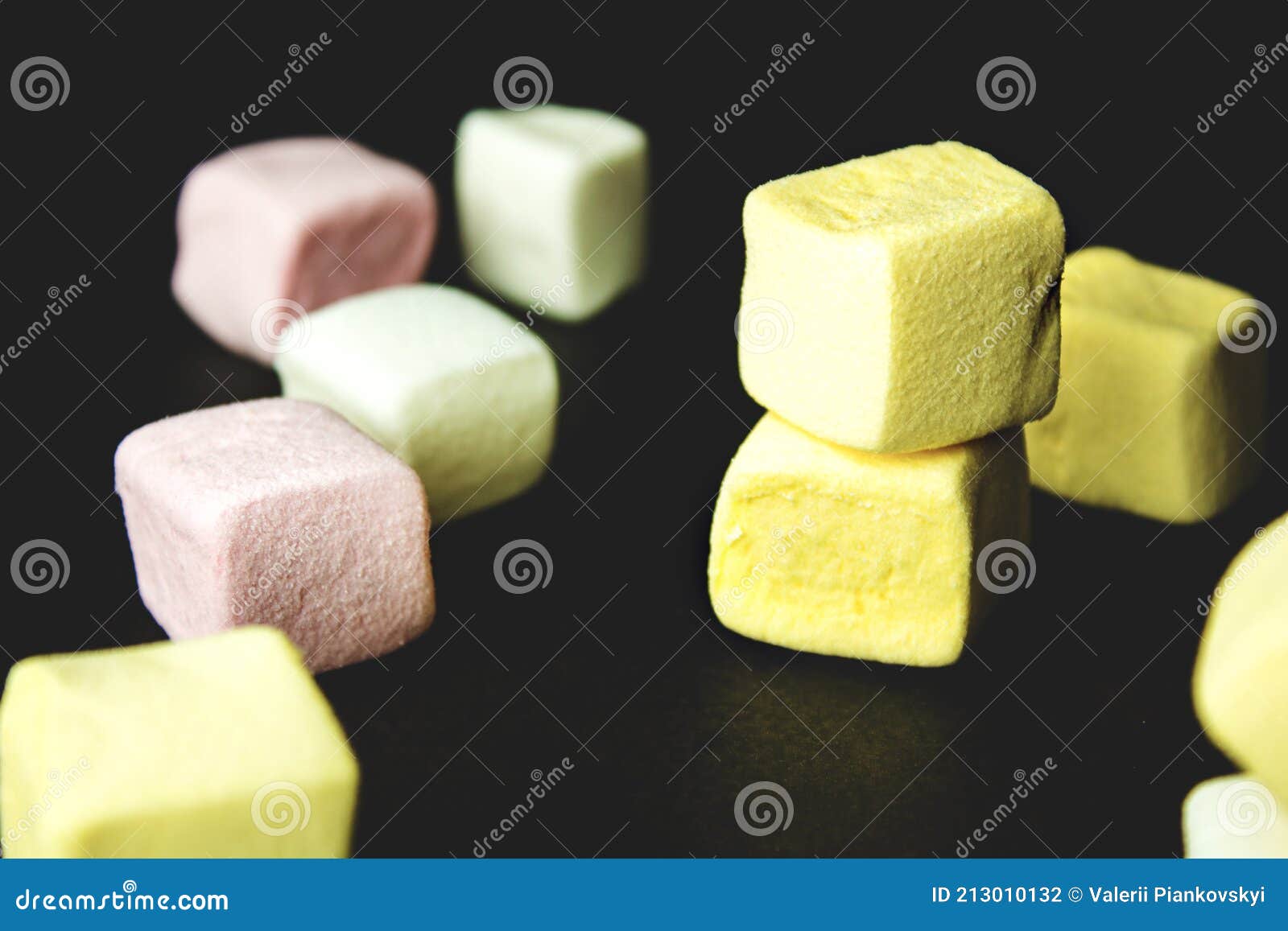 Scattered Yellow Marshmallows, on a Dark Background, Close-up, Still ...