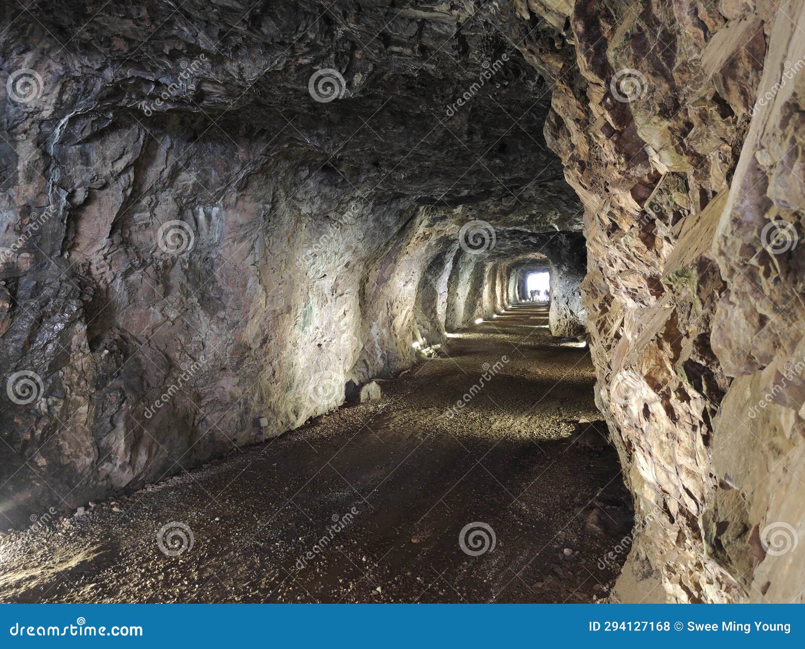 Scene Around the Tunnel Passage in the Dark Cave. Stock Photo - Image ...