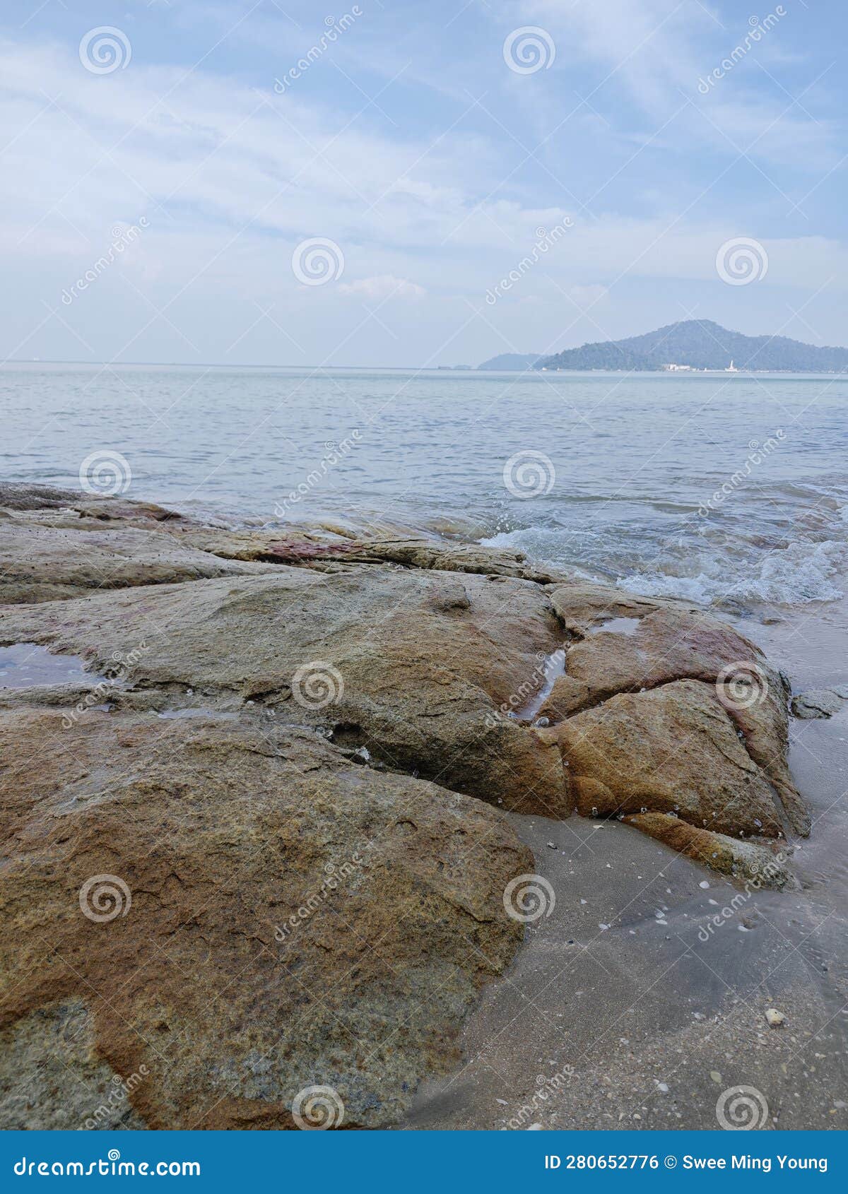 Scene of Boulder Laying Along the Sandy Beach Stock Photo - Image of ...