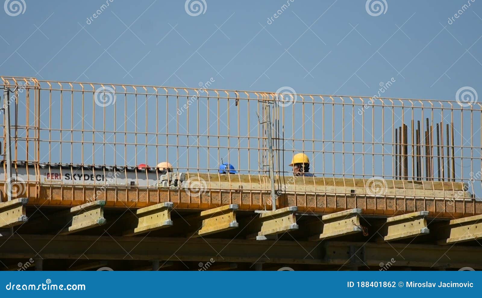 Scene of Crane at Building Construction Site with Workers on Buliding ...