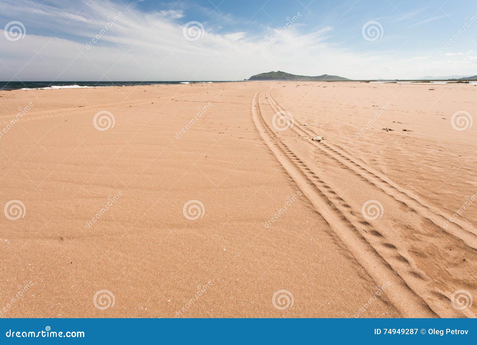 Scene of a Long Car Trace on the Beach on Sunny Day. Wide Angle Stock ...