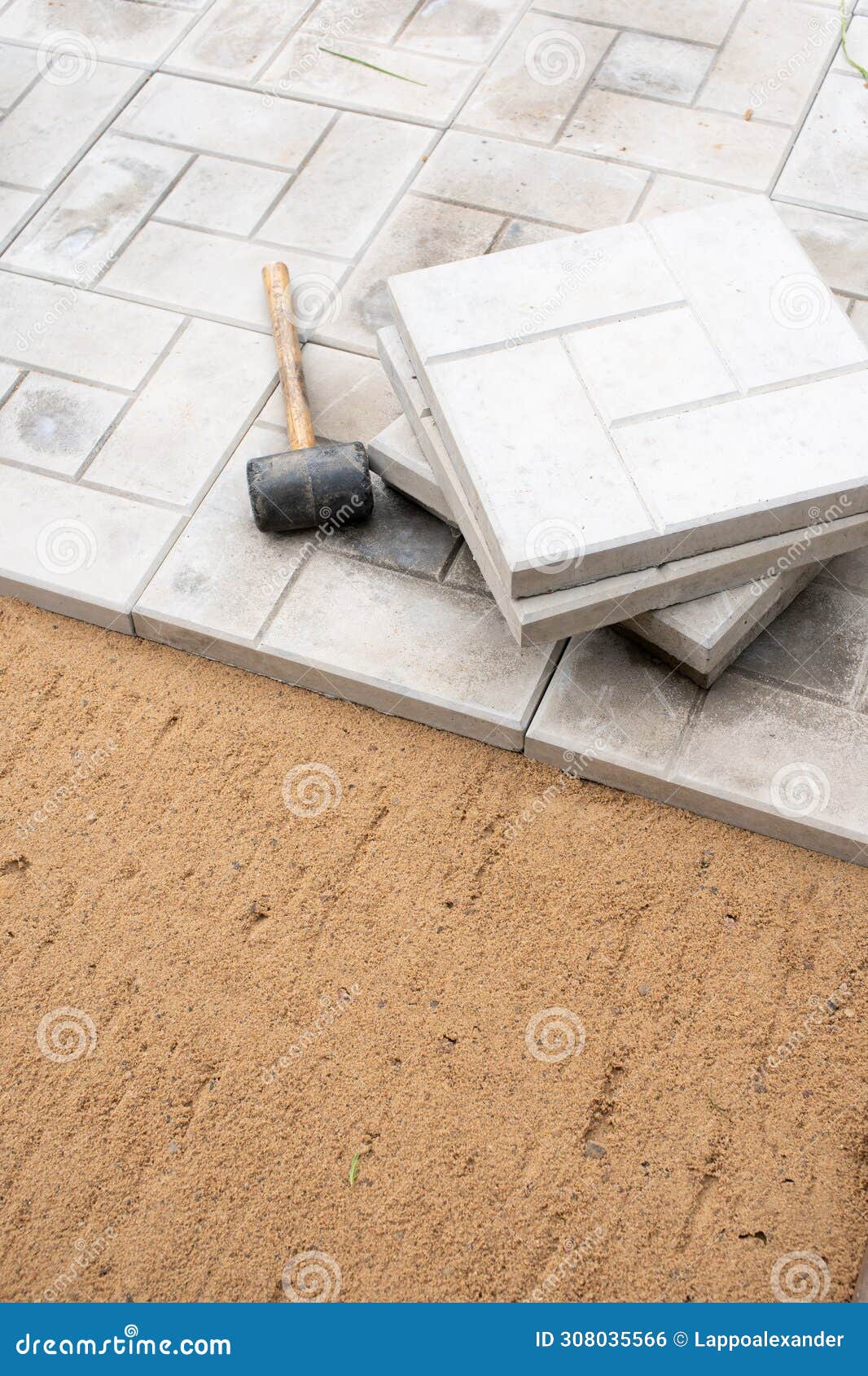 Scene of an Ongoing Pavement or Tile Installation. There is a Rubber ...