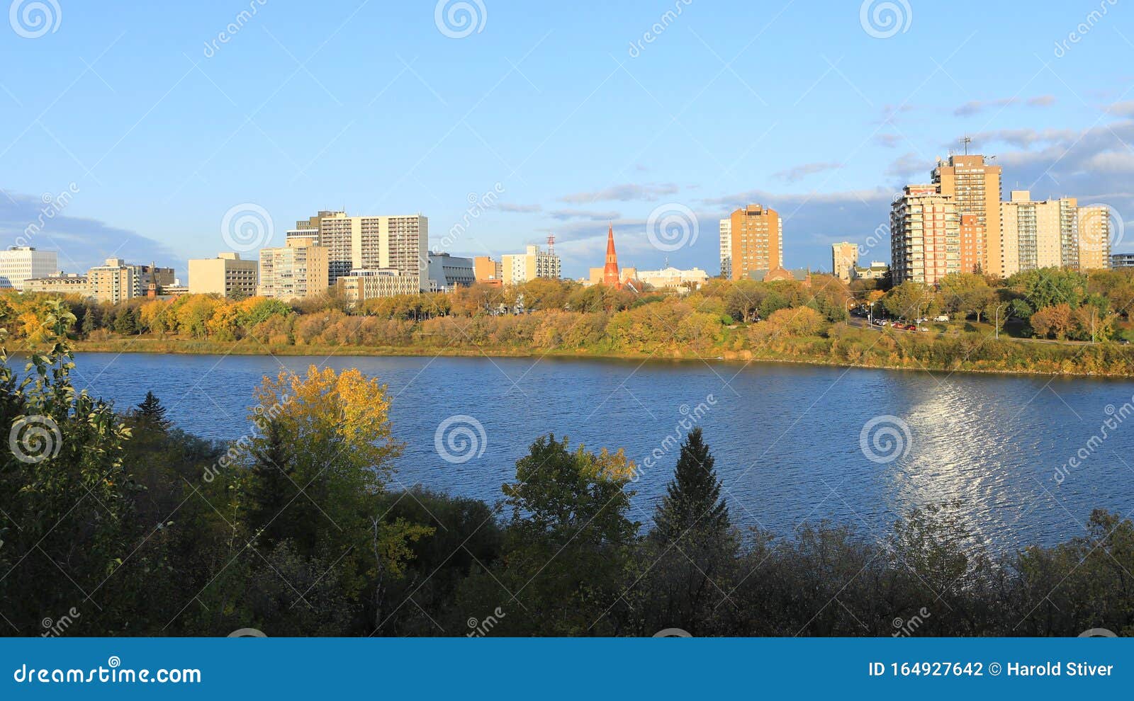 Scene of Saskatoon, Canada Skyline Over River Stock Photo - Image of ...