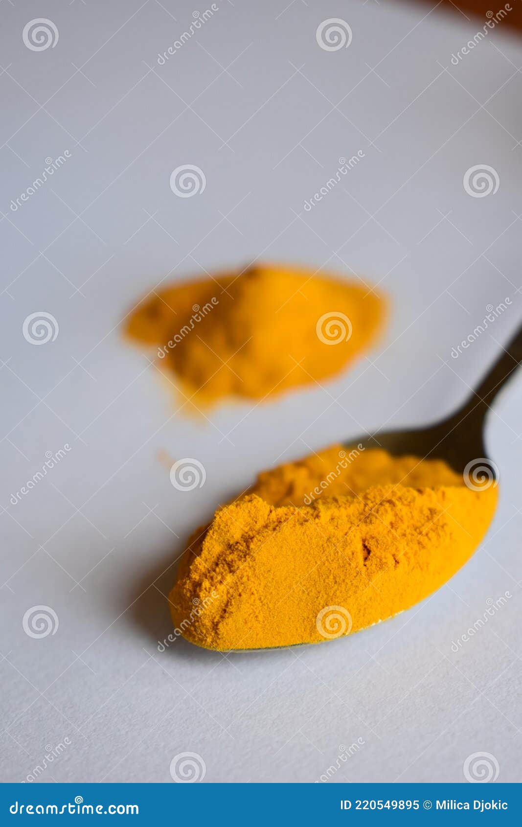 A Scene of Spoon Full of Turmeric Powder Stock Image - Image of scene ...