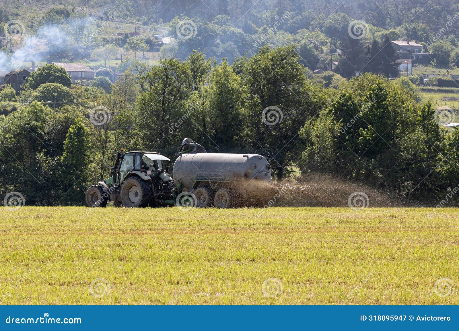 Tractor in a Crop Field Spreading Liquid Manure Stock Image - Image of ...