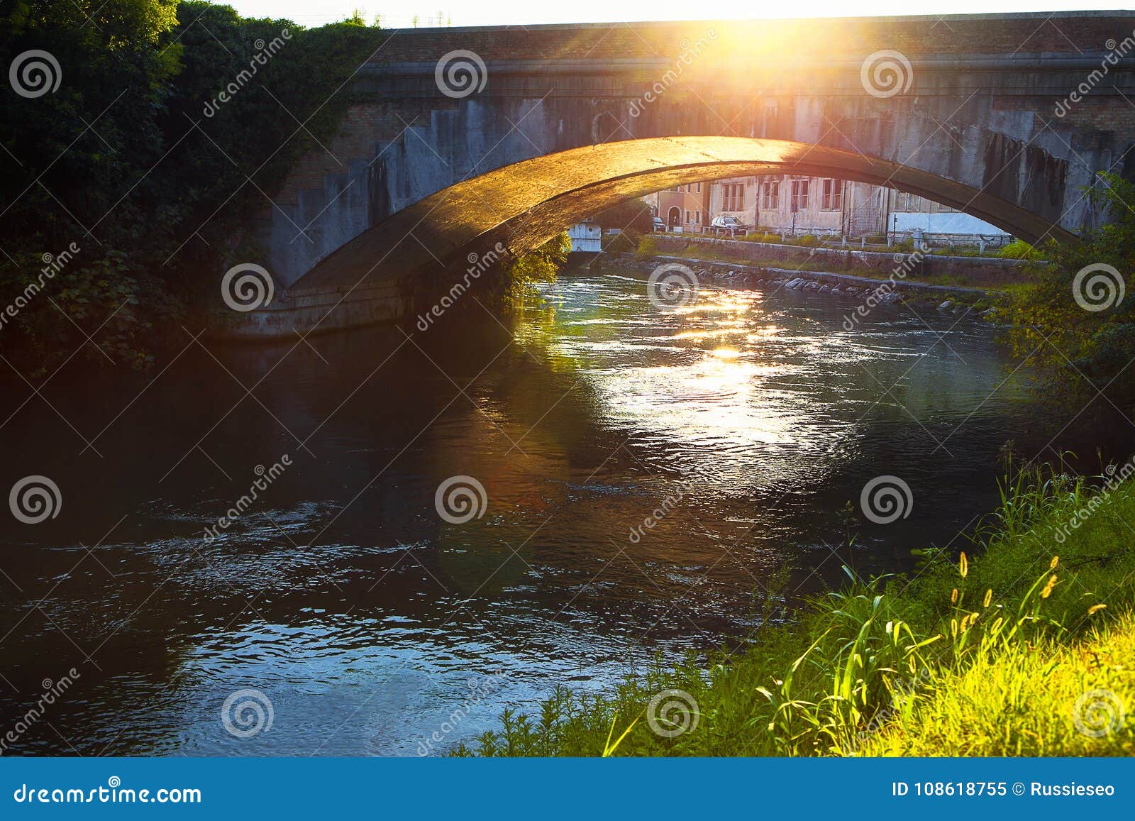 Sunlight under the bridge stock image. Image of lake - 108618755