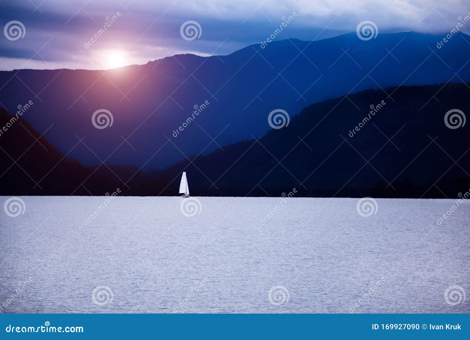 Scenery with Sailboat on Lake in Sunrise Light Stock Photo - Image of ...