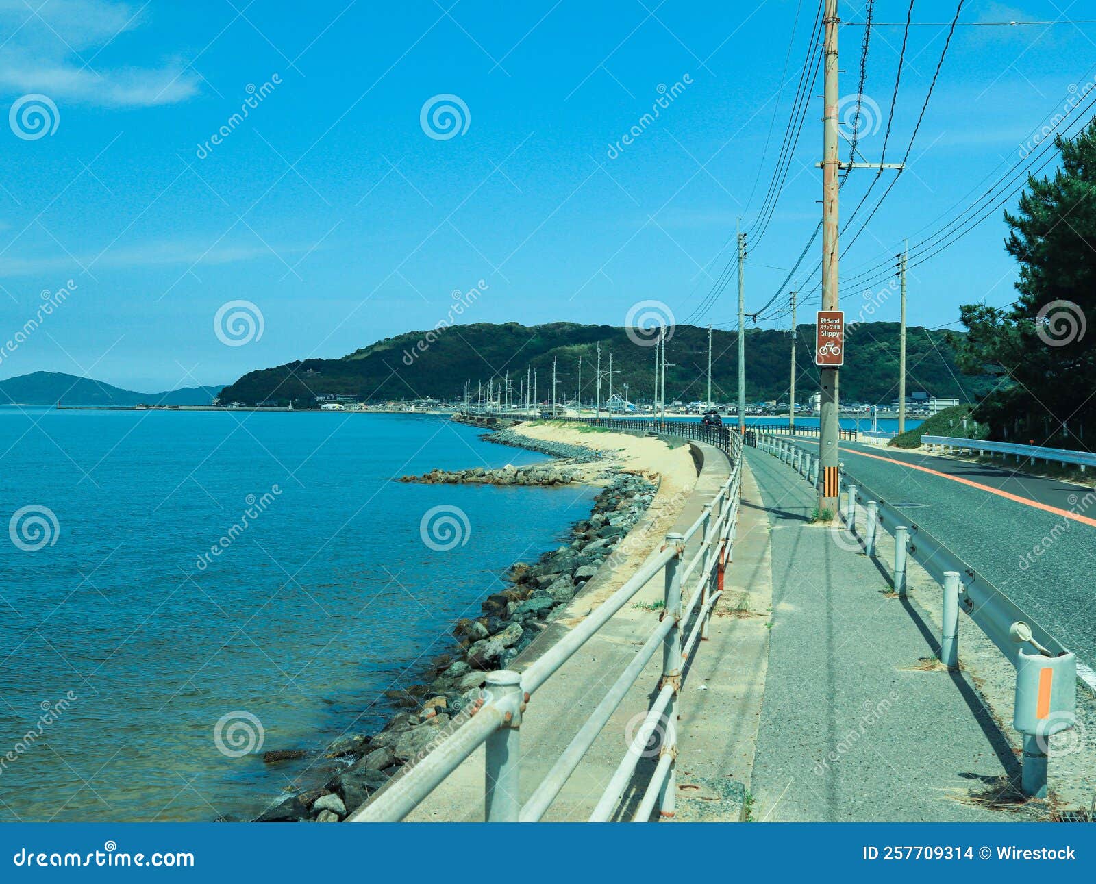 Scenery of a Sidewalk on the Beach Stock Photo - Image of harbor, water ...