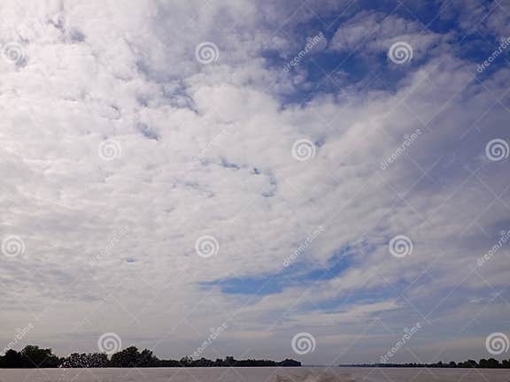 Scenery of Sky with Many Cloud and River Stock Photo - Image of sunlight, ocean: 261628146