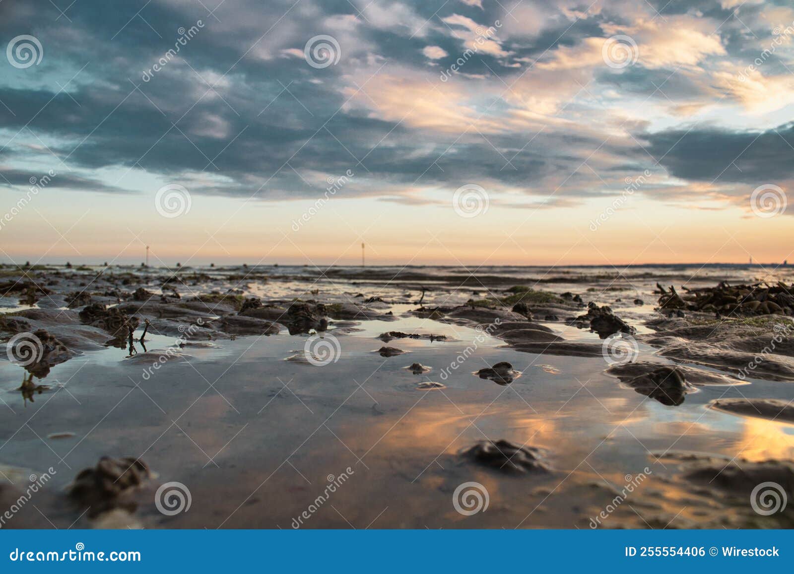 Scenic Beach with Big Rocks during a Dramatic Sunset Stock Photo ...