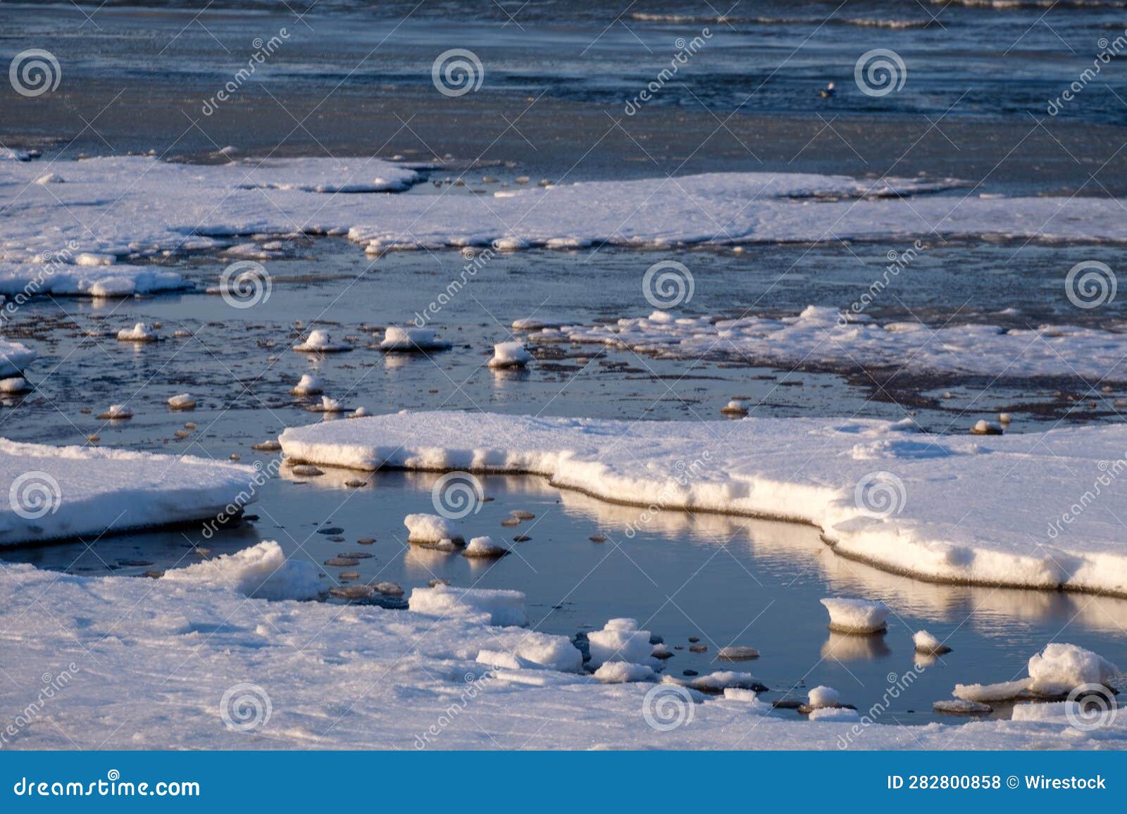 Scenic Close-up of Snow Pieces on the Beach Stock Photo - Image of ...