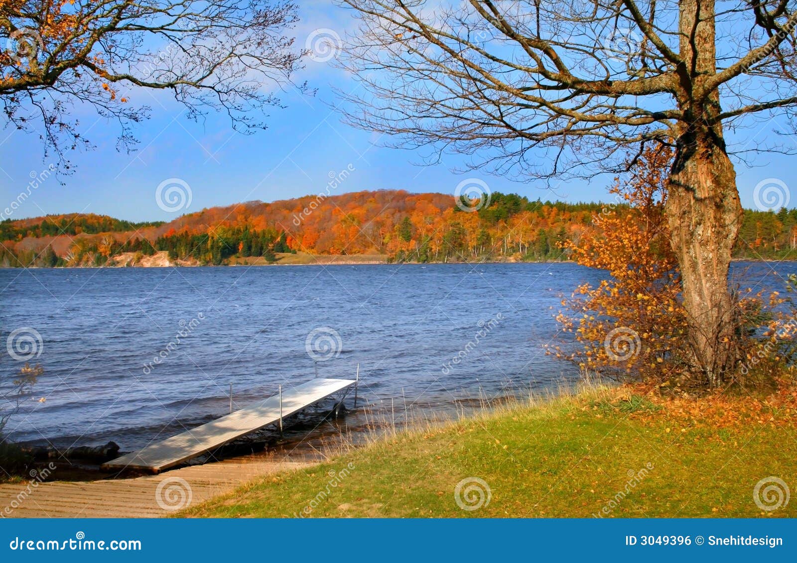 Scenic Lake during Autumn stock photo. Image of dock, boat - 3049396