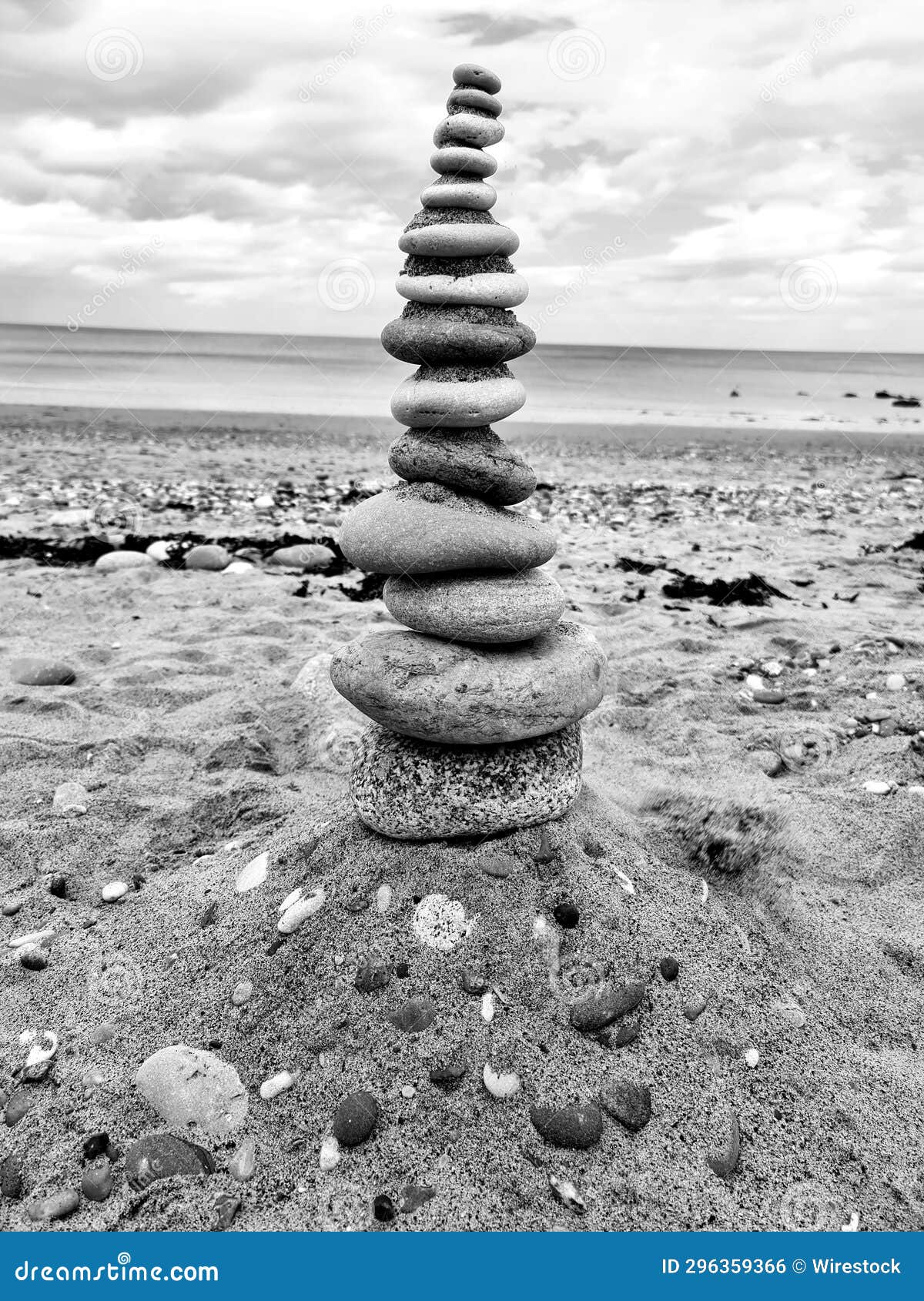 Scenic Landscape of a Beach with a Stack of Rocks in the Foreground, in ...