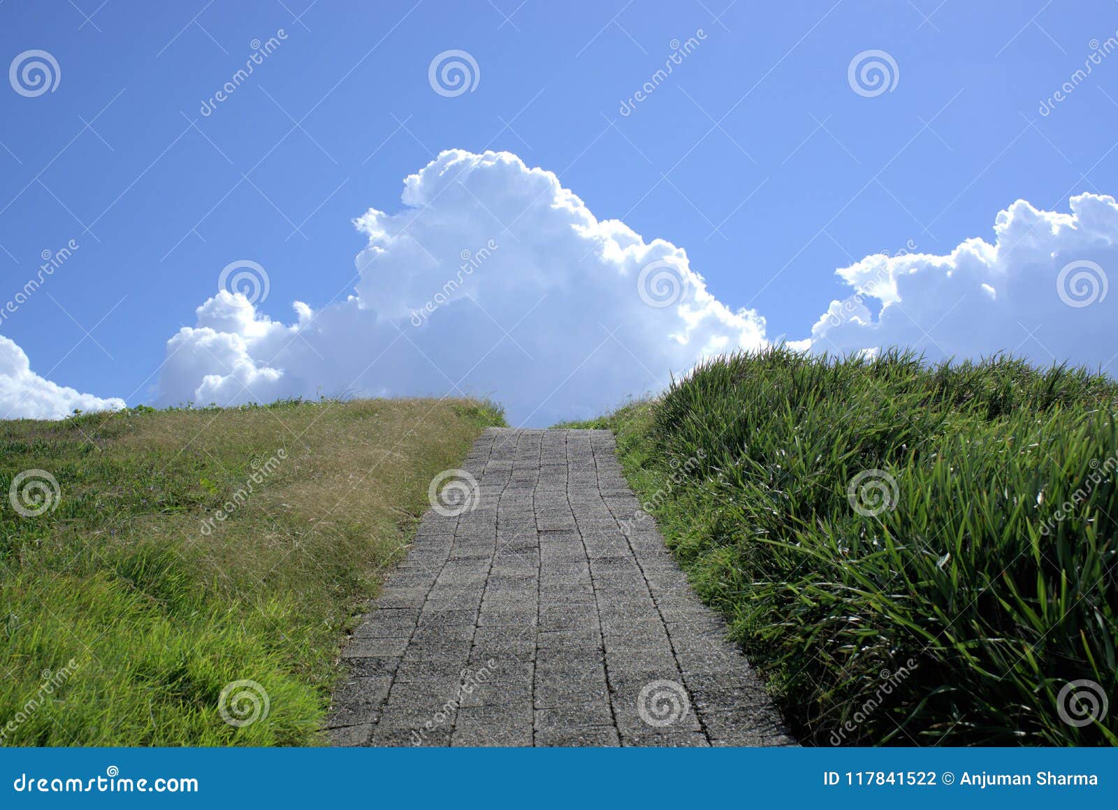 Scenic Path on Hill Going Towards Clouds in Sky. Stock Photo - Image of ...