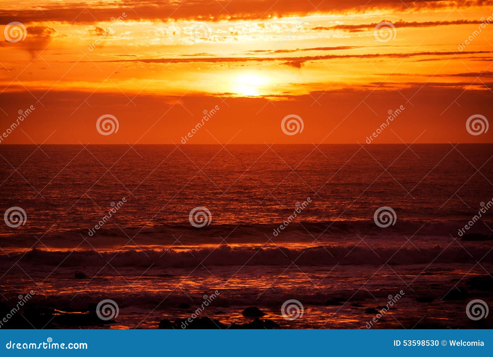 Scenic Red Ocean Sunset stock photo. Image of ocean, wavy - 53598530