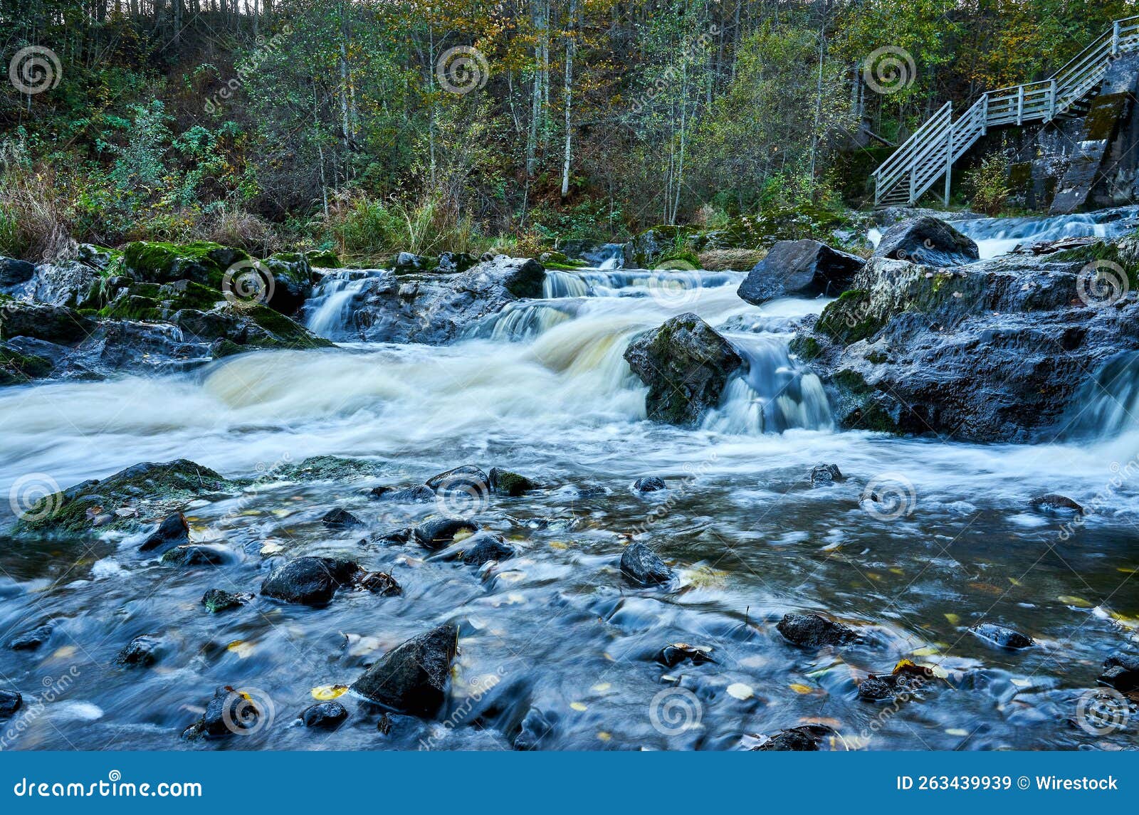 Scenic Shot of the Flow of a Rocky River with a Silky Water Effect ...