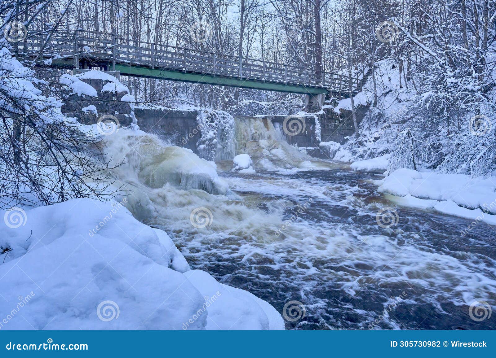 Scenic Snowy Forest with a Bridge and Waterfall Stock Photo - Image of ...