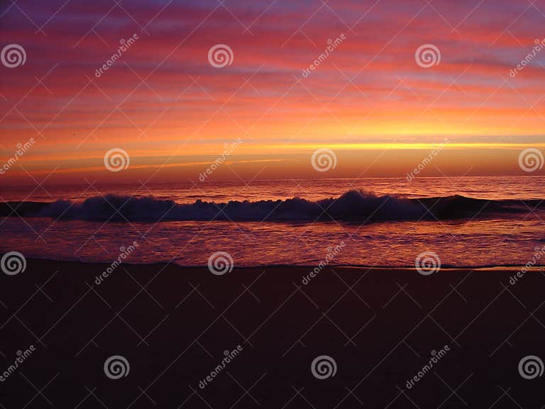 Scenic View of a Beachfront at Sunset Stock Photo - Image of evening ...