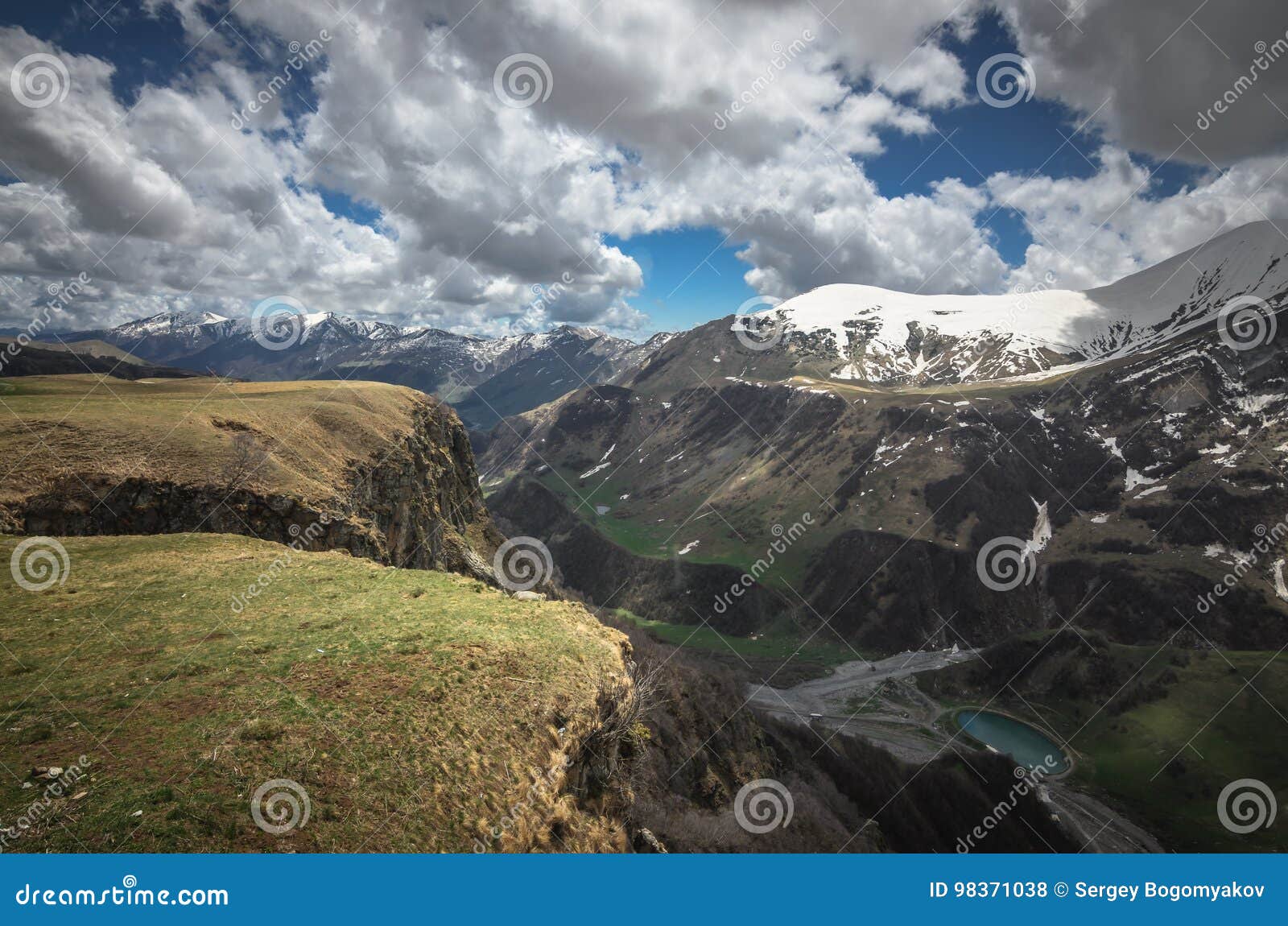 Scenic View on Caucasus Mountains in Georgia. a Small River Flows Down ...
