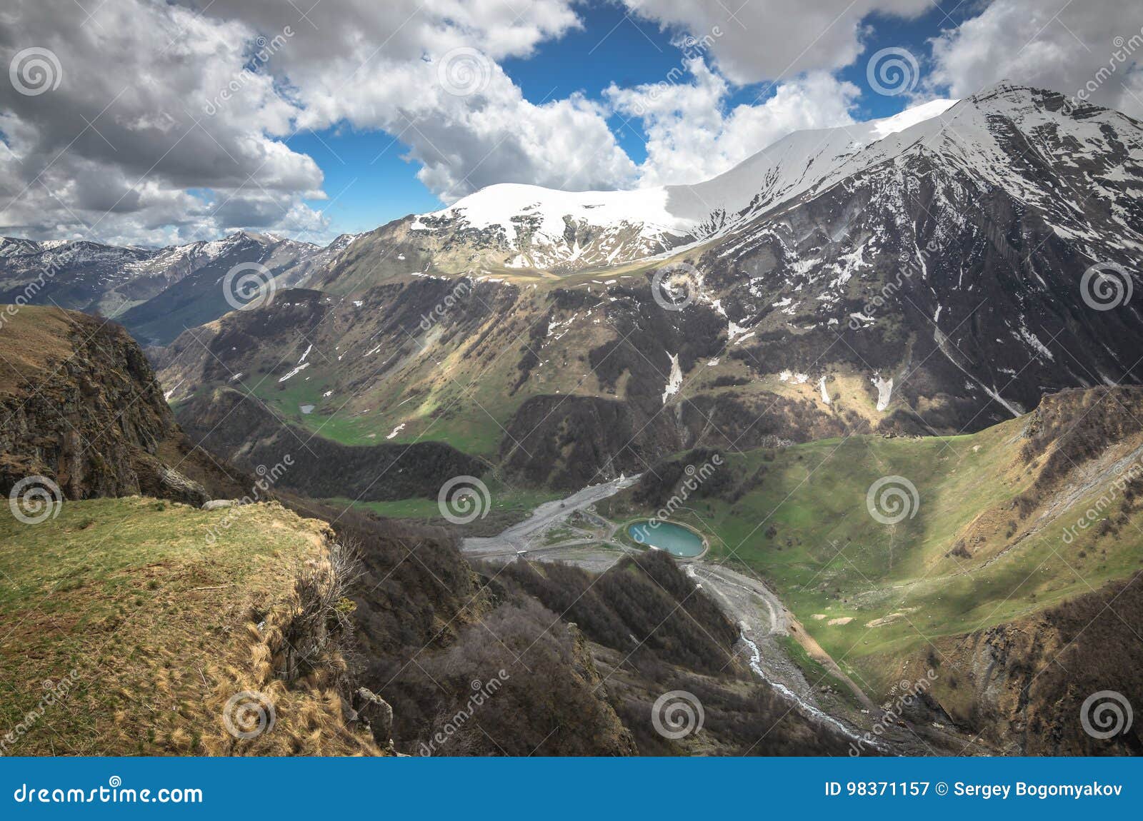 Scenic View on Caucasus Mountains in Georgia. a Small River Flows Down ...