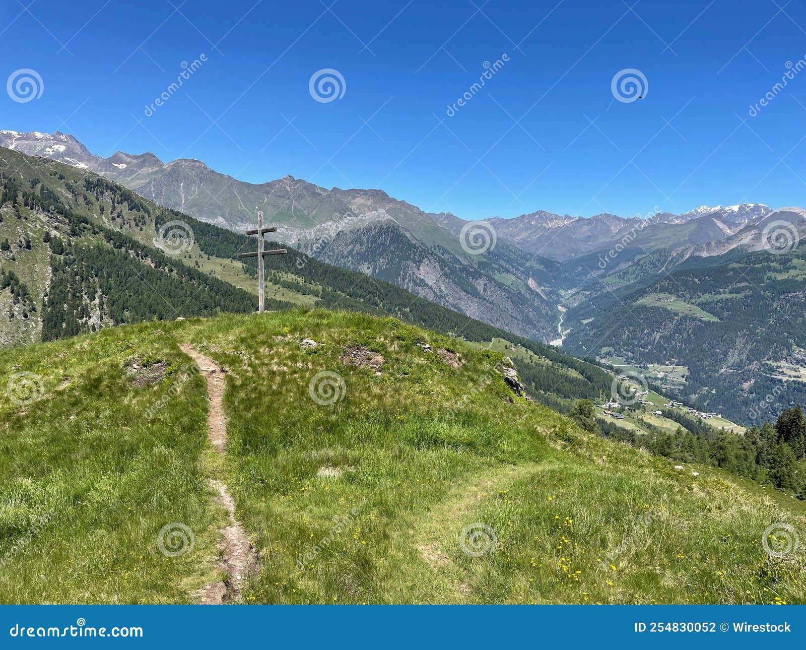 Scenic View of a Cross Against Forests on a Slope of a Mountain Range ...