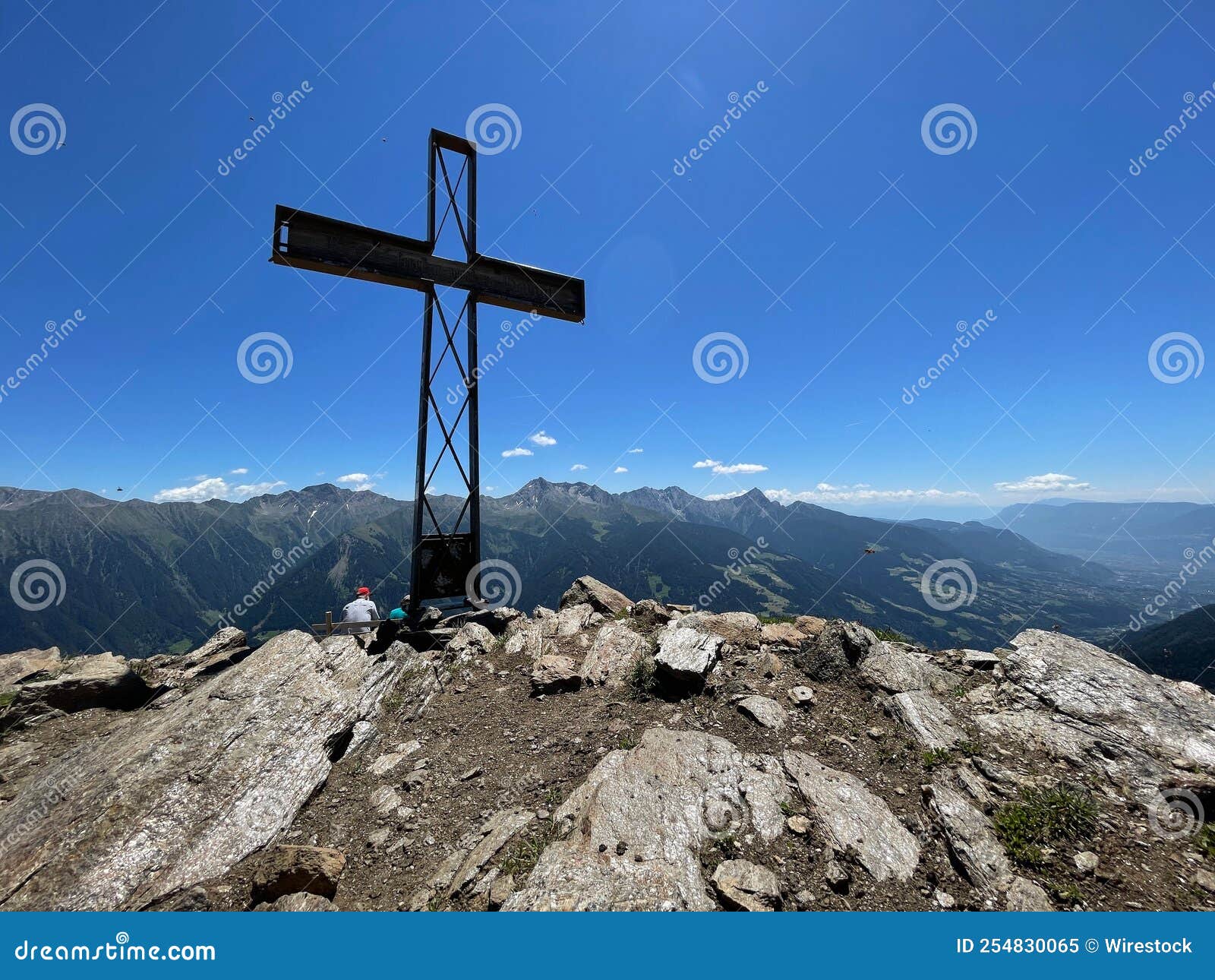 Scenic View of a Cross Against Forests on a Slope of a Mountain Range ...