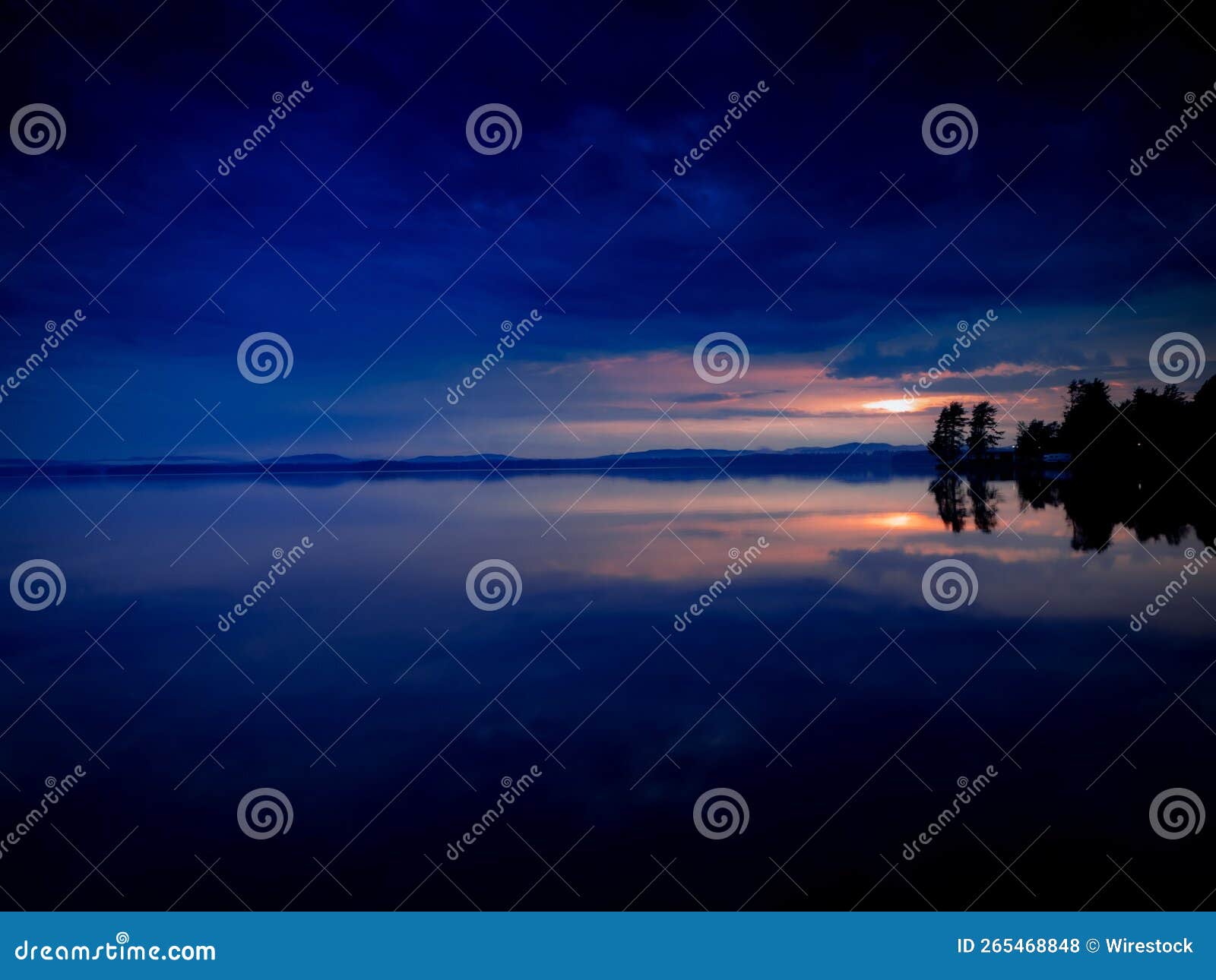 Scenic View of a Dramatic Sky Reflecting in a Tranquil Lake during ...