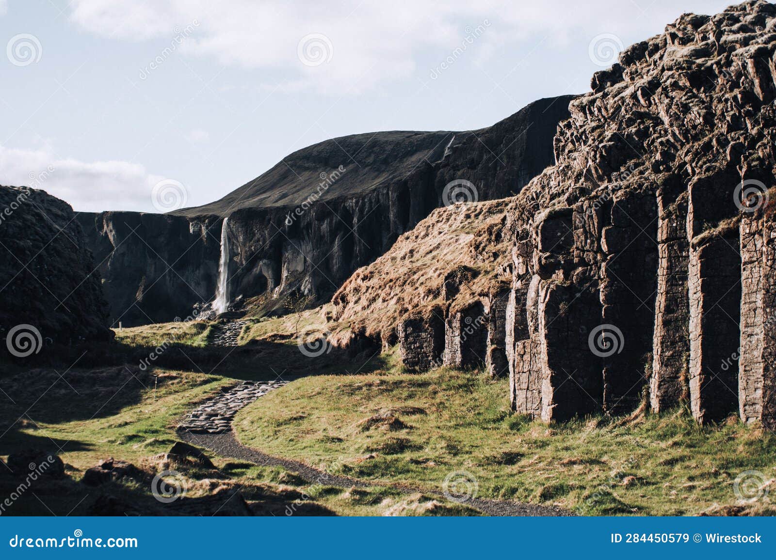 Scenic View of an Impressive Waterfall Cascading Down from a Rocky ...