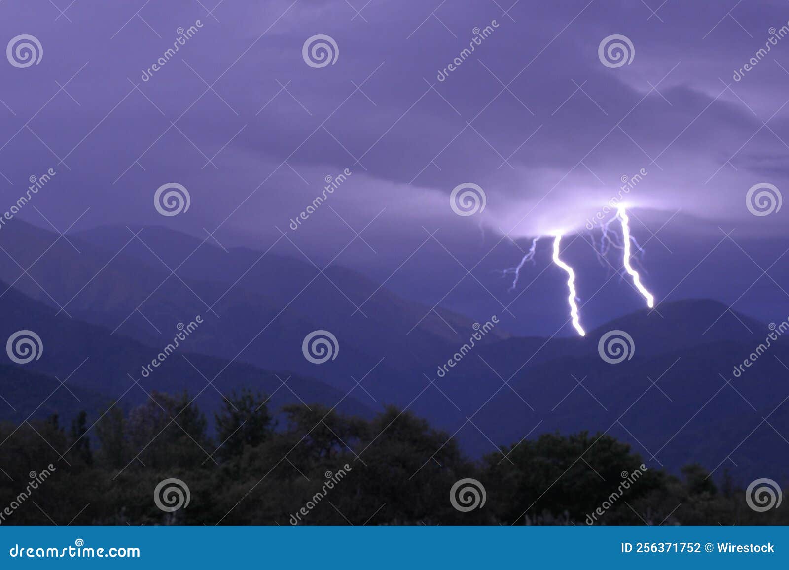 Scenic View of Lightning Striking at Night on Hills with Purple Sky ...