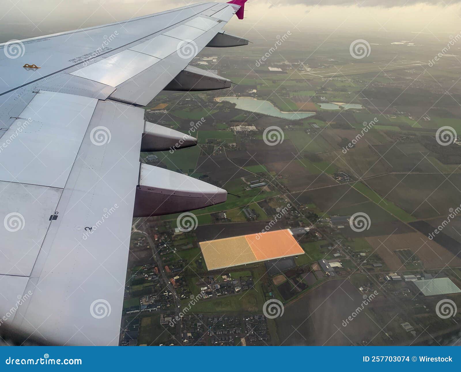 Scenic View of a Plane Wing High Above the Sky Stock Photo - Image of ...