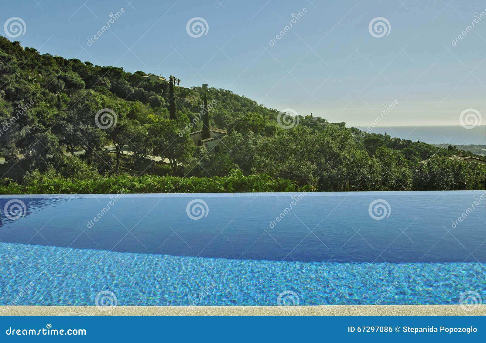 Scenic View from the Pool on the Green Hills and the Sea. Stock Photo ...