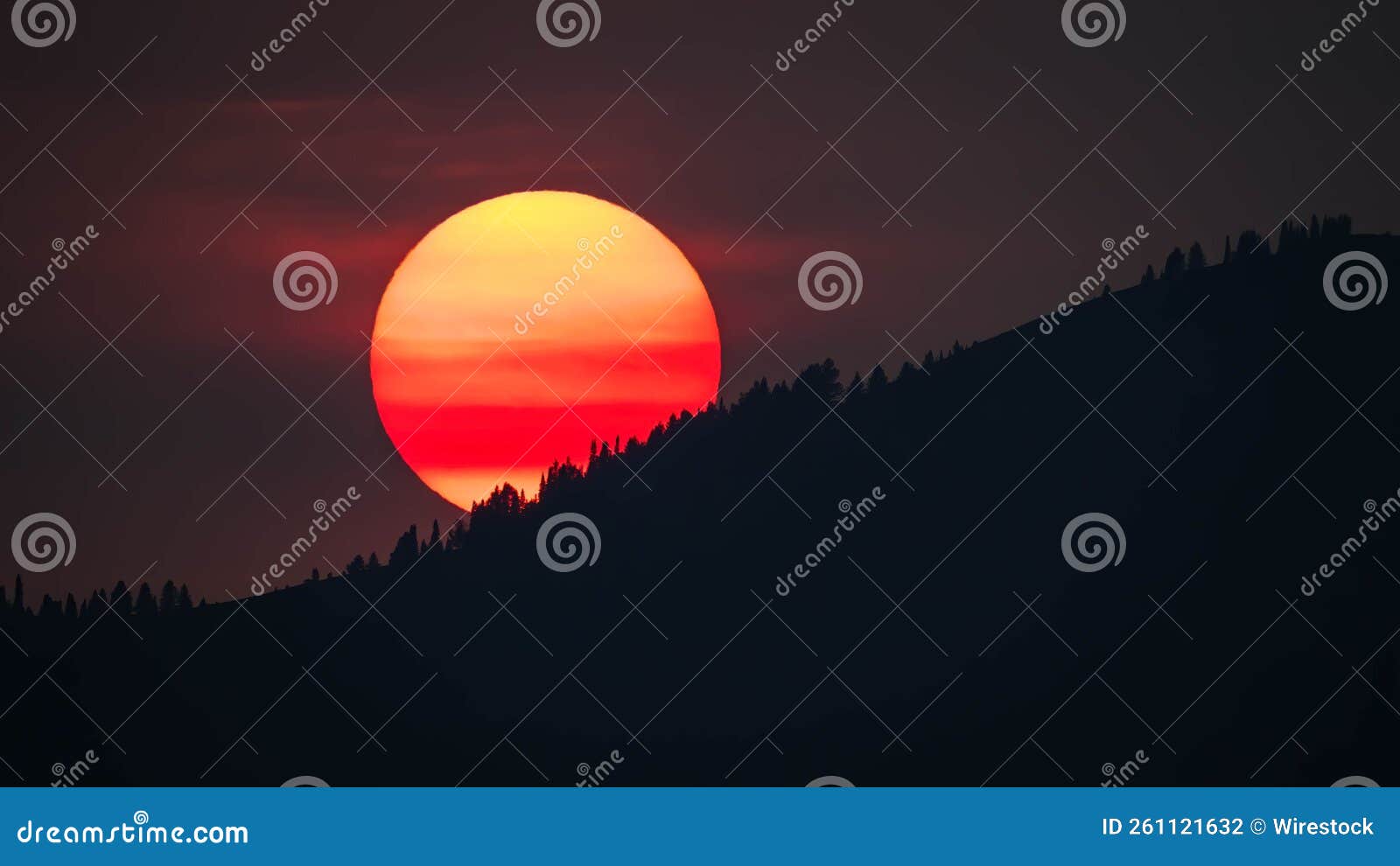 Scenic View of a Silhouette of a Hill with the Bright Red Moon in the ...