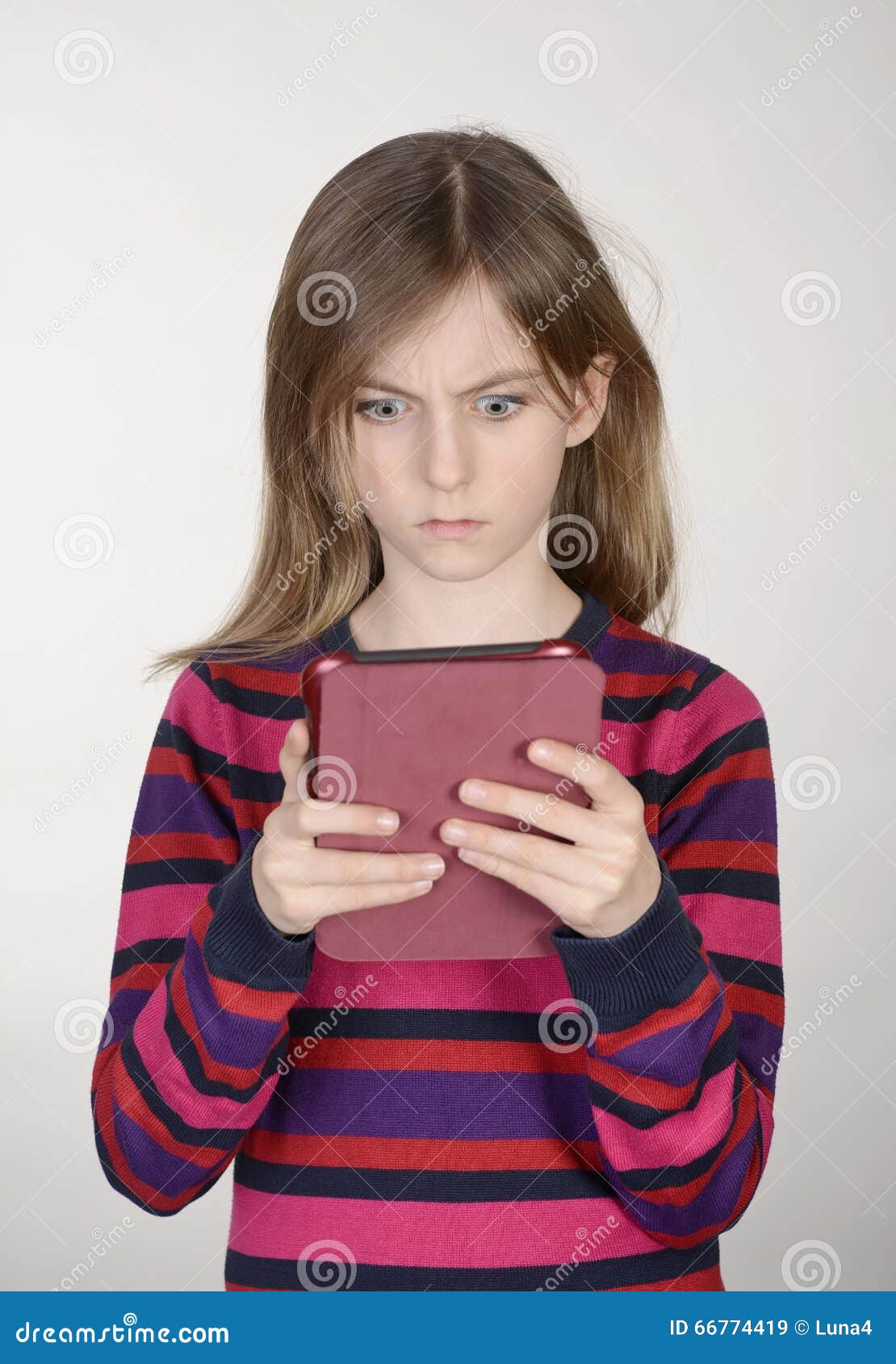 Sceptical Girl Holding Digital Tablet Stock Image - Image of scaring ...