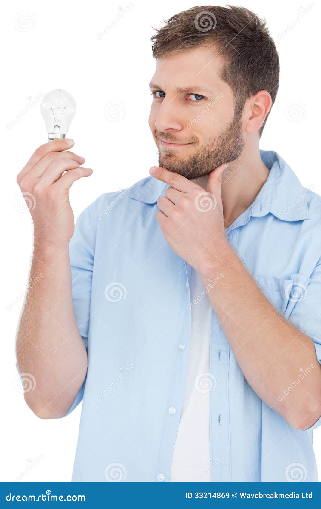 Sceptical Model Holding A Bulb And Looking At Camera Stock Image ...
