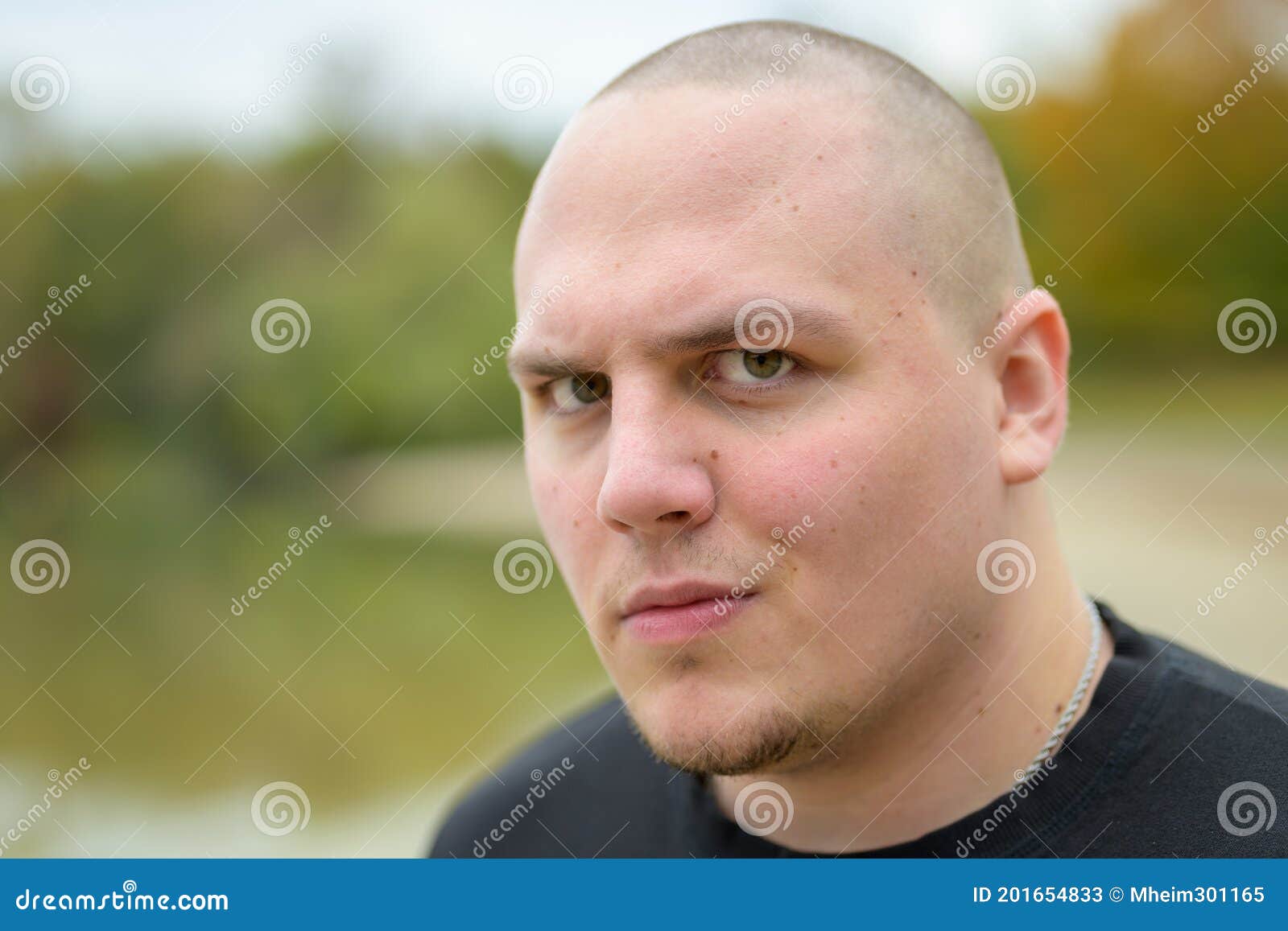 Sceptical Young Man Looking Sideways at the Camera Stock Image - Image ...