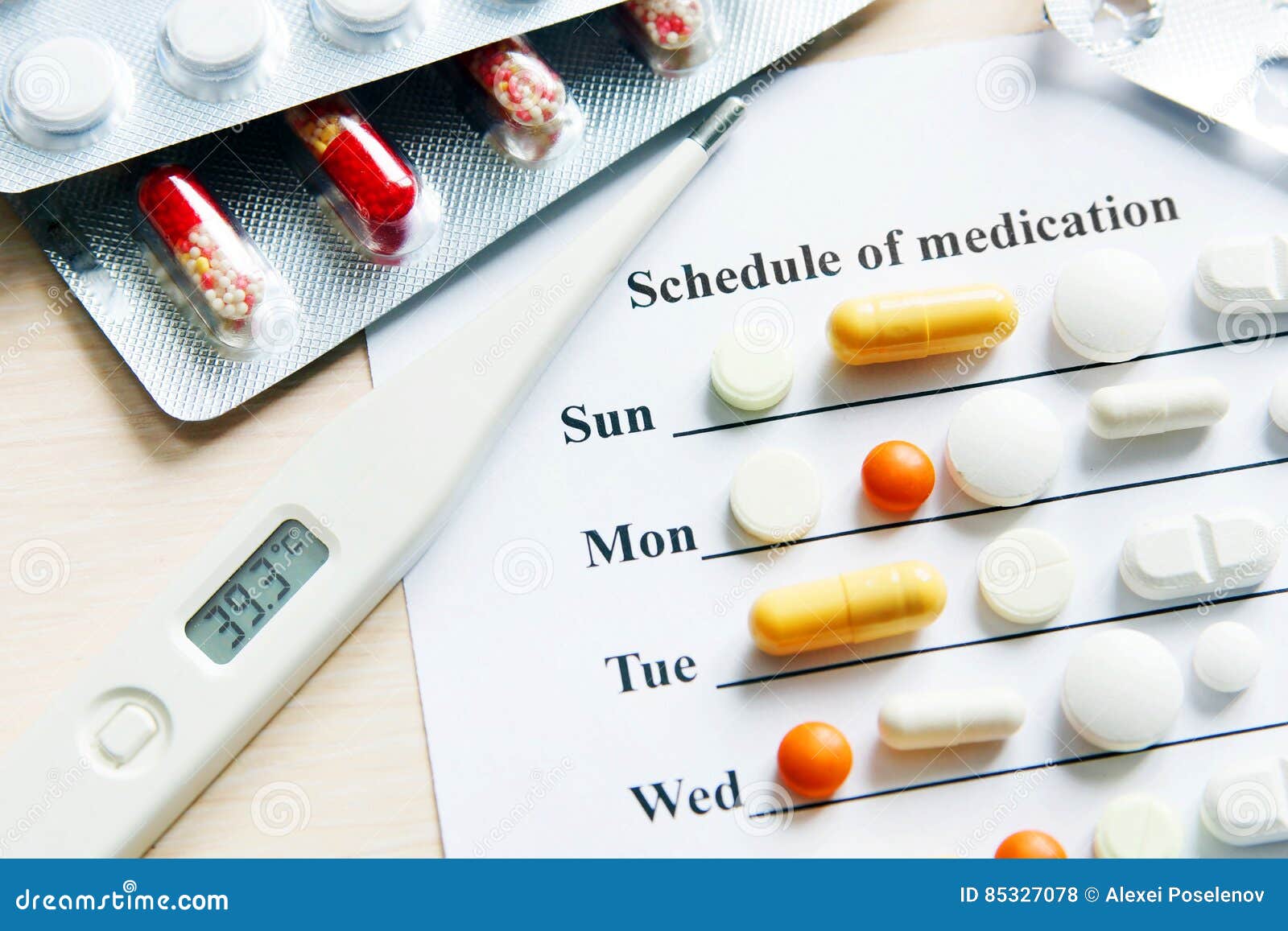 Schedule of Medication for a Week with Various Pills and Thermometer ...