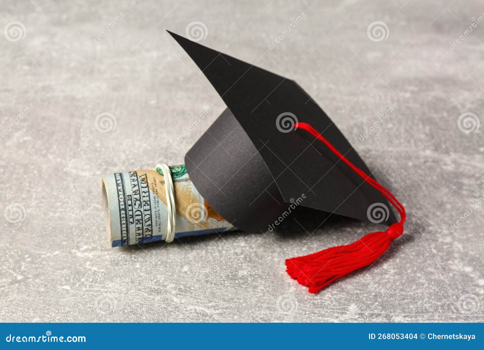 Scholarship Concept. Graduation Cap and Banknotes on Light Grey Table ...