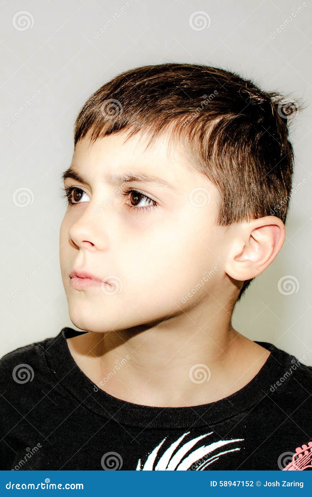 School Age Boy Looking Serious To Side Stock Photo - Image of education ...