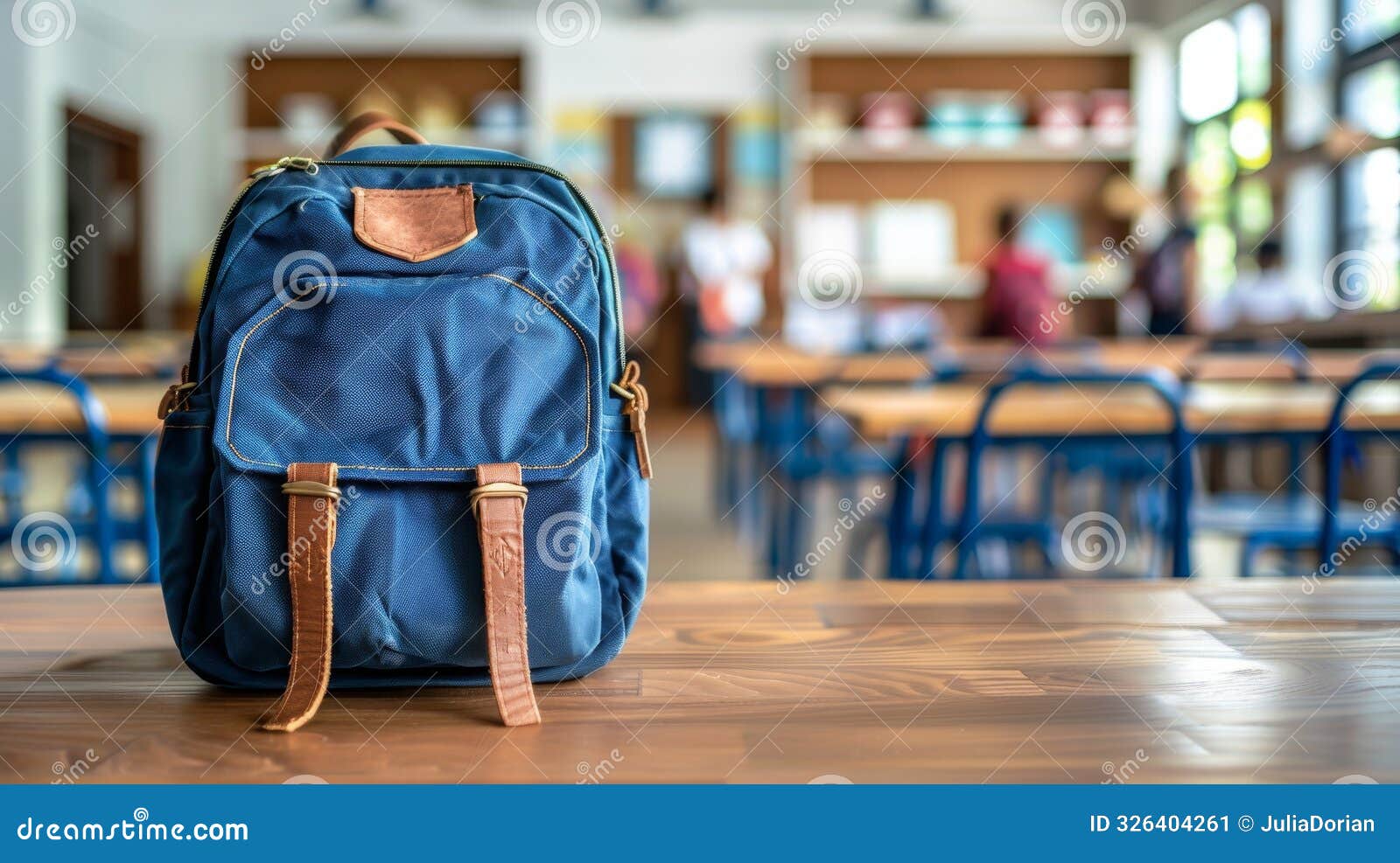 School Backpack on Table with Classroom of Kids in Background Back To ...