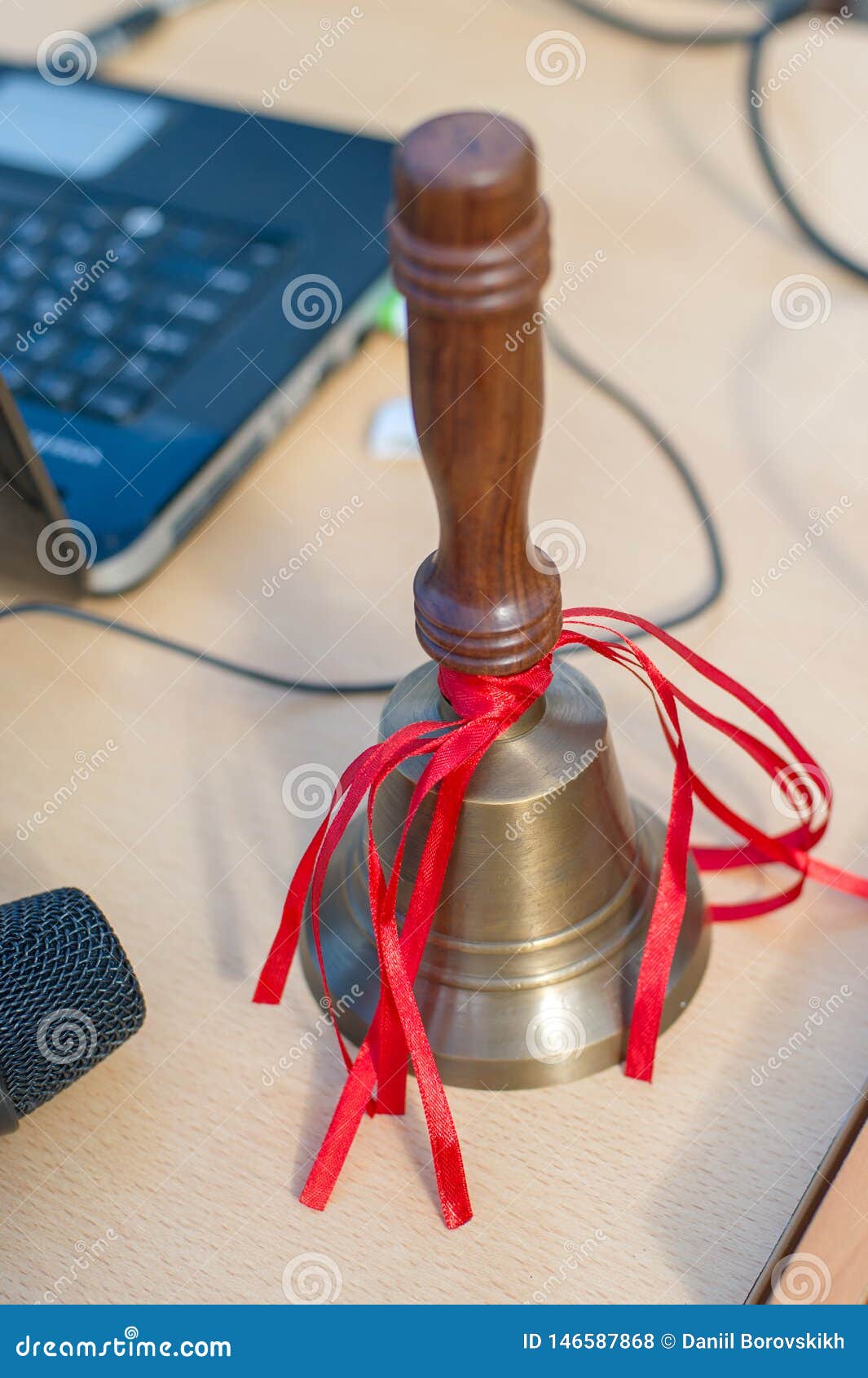 The School Bell on the Table with Red Ribbons Stock Photo - Image of ...