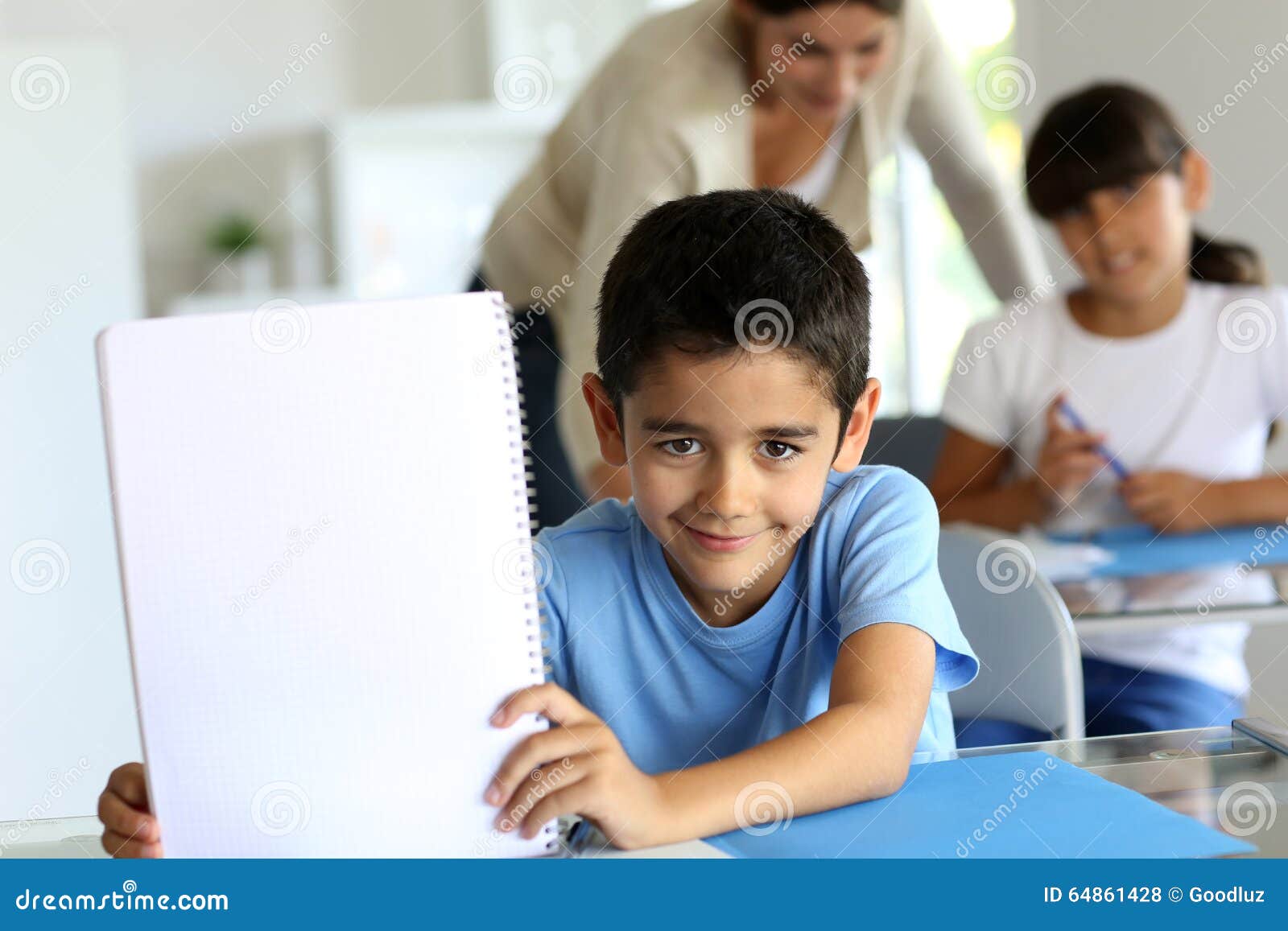 School Boy with Blank Notebook in Class Stock Photo - Image of page ...