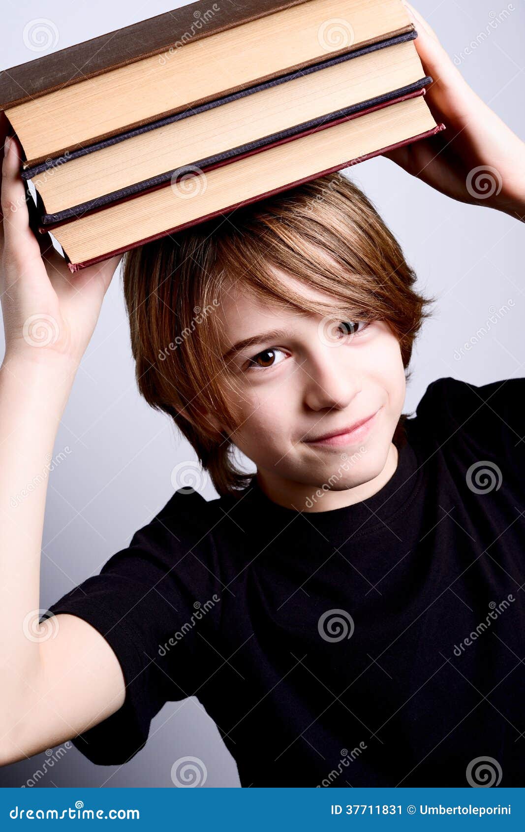 School boy with books stock image. Image of childhood - 37711831