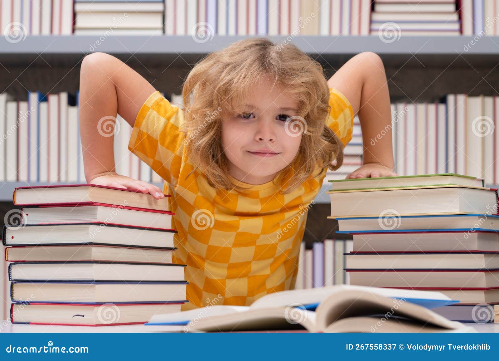 School Boy. Child Pupil Reading Book in a Book Store or School Library ...