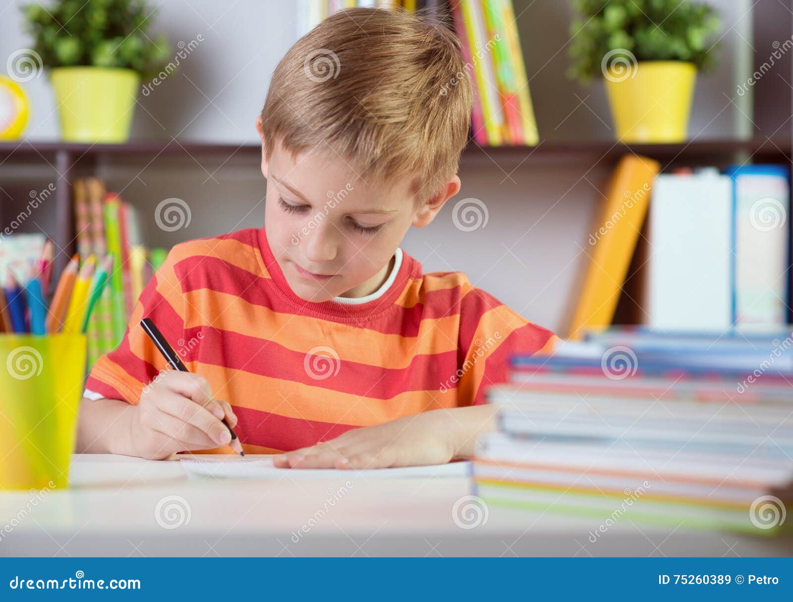 School Boy at Classroom Desk Making Schoolwork Stock Image - Image of ...