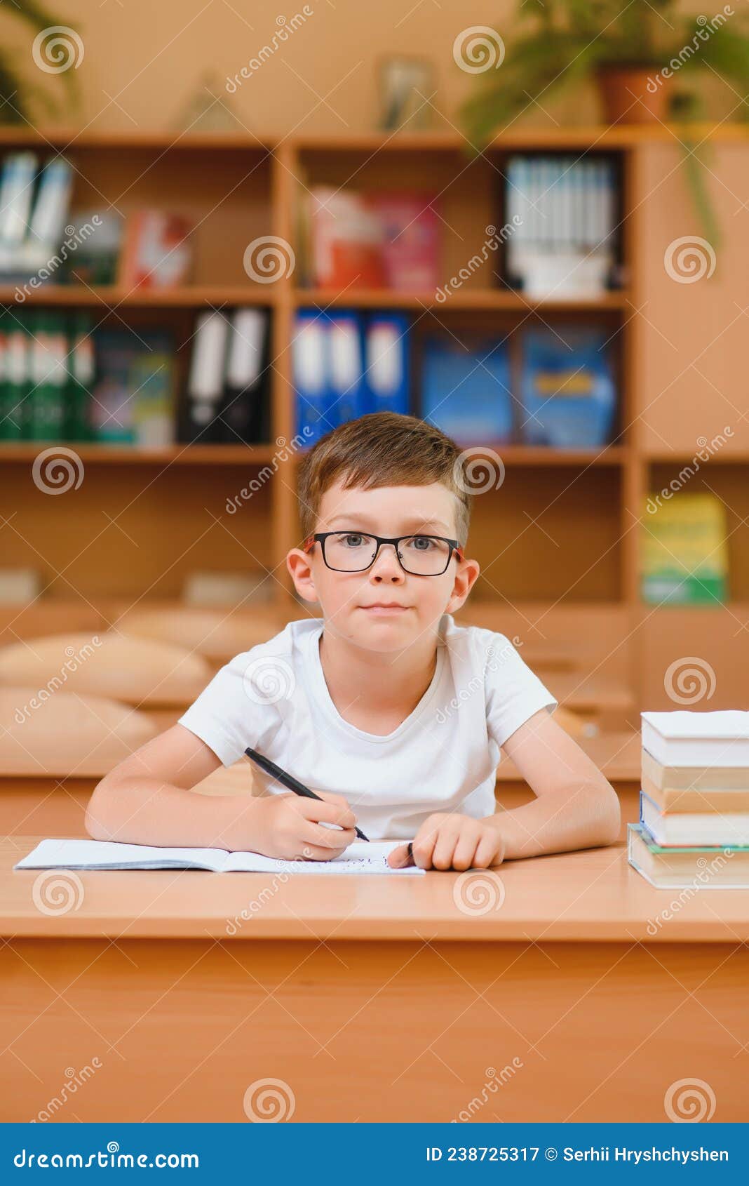 School Boy in Classroom at Lesson Stock Image - Image of classroom ...