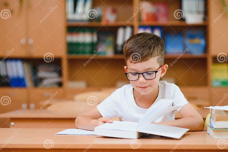 School Boy in Classroom at Lesson Stock Image - Image of classroom ...