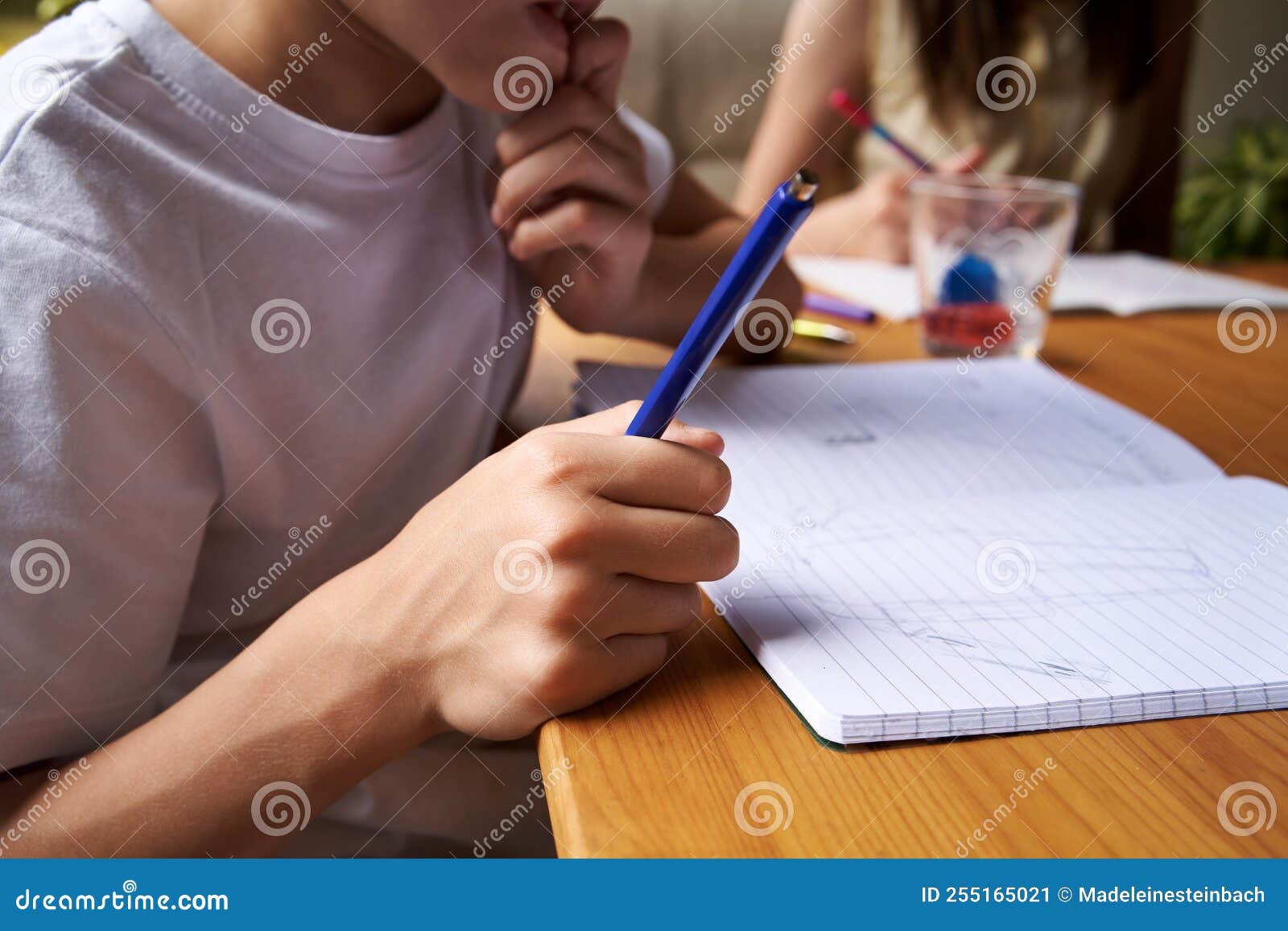School Boy Drawing into Exercise Book, Doing Homework Stock Image ...